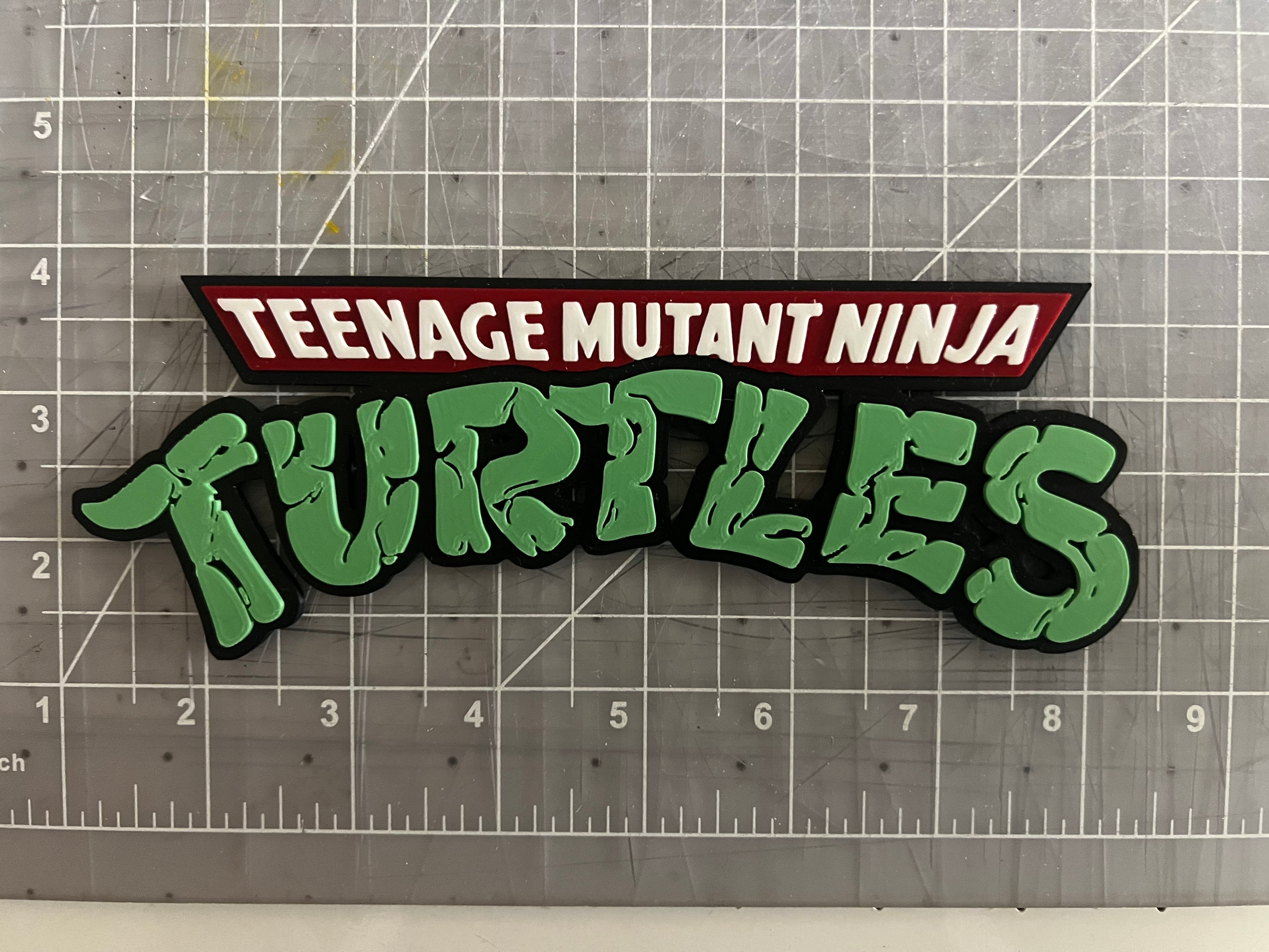 Teenage Mutant Ninja Turtles Logo Plaque – Shadow Pop Displays